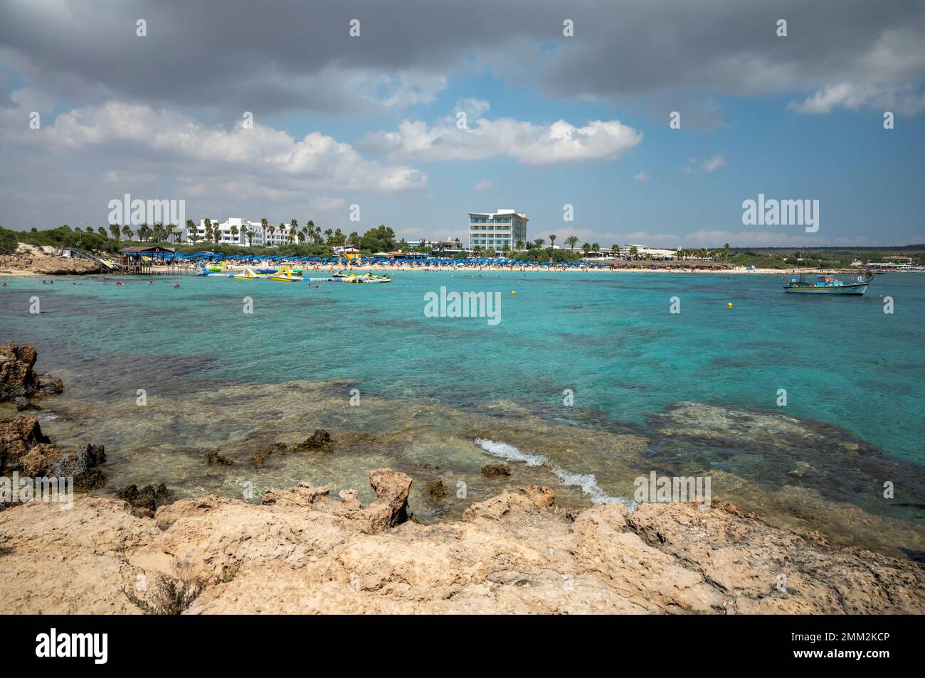 View on seashore with blue crystal clear water on Mediterranean sea ...