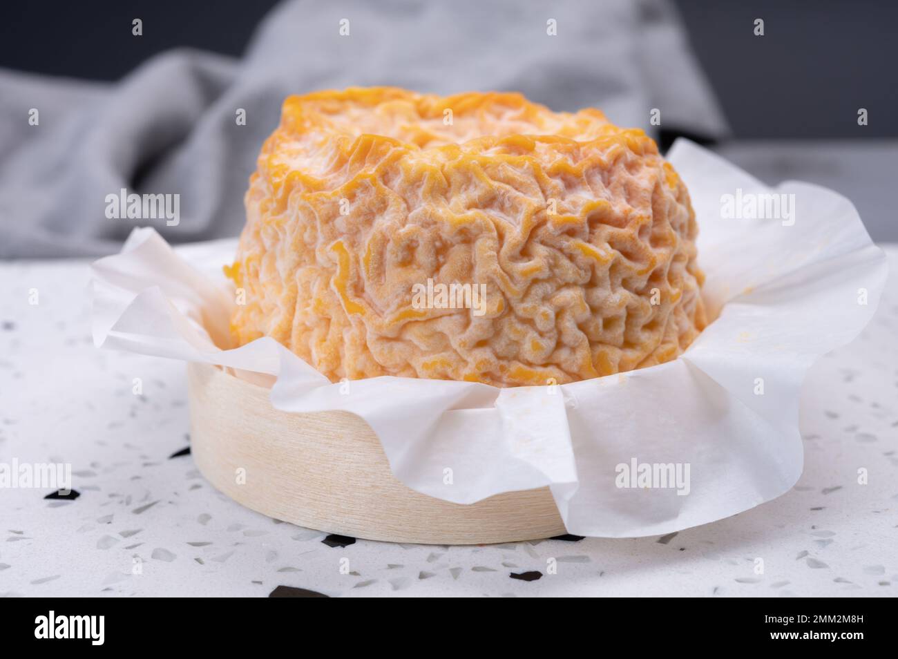 French Langres soft cows crumbly cheese with washed rind structure made ...