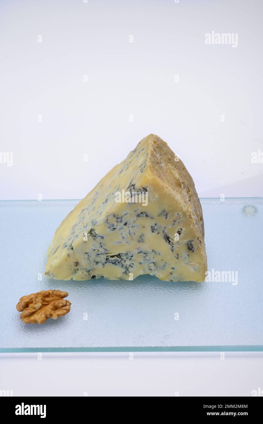 Cheese collection, piece of English old stilton blue cheese close up ...