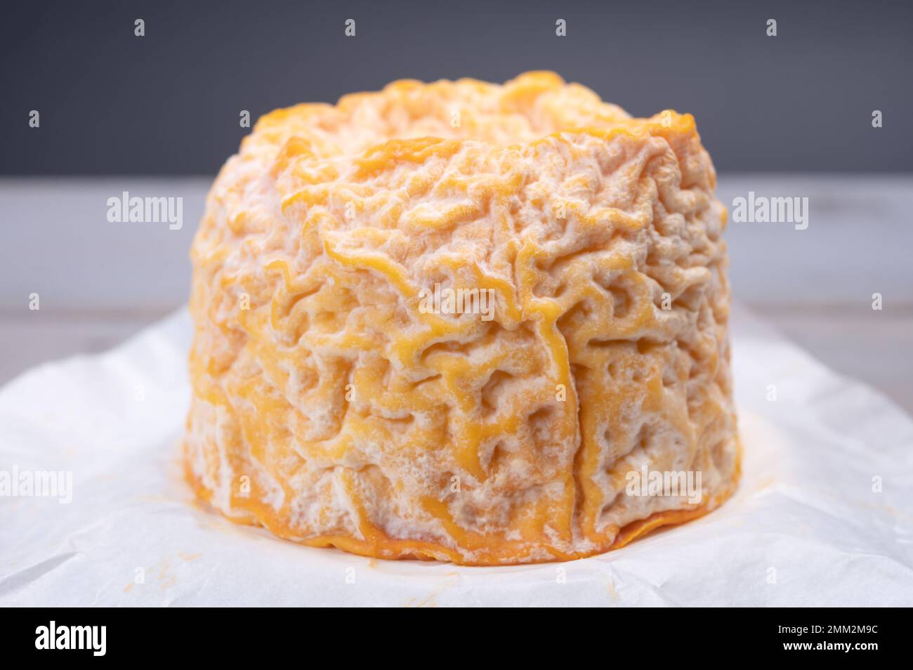French Langres soft cows crumbly cheese with washed rind structure made ...