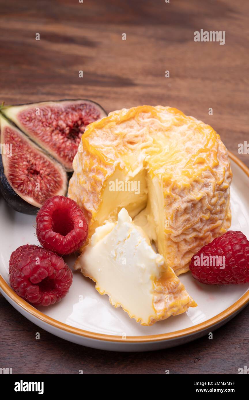 French Langres soft cows crumbly cheese with washed rind structure made ...