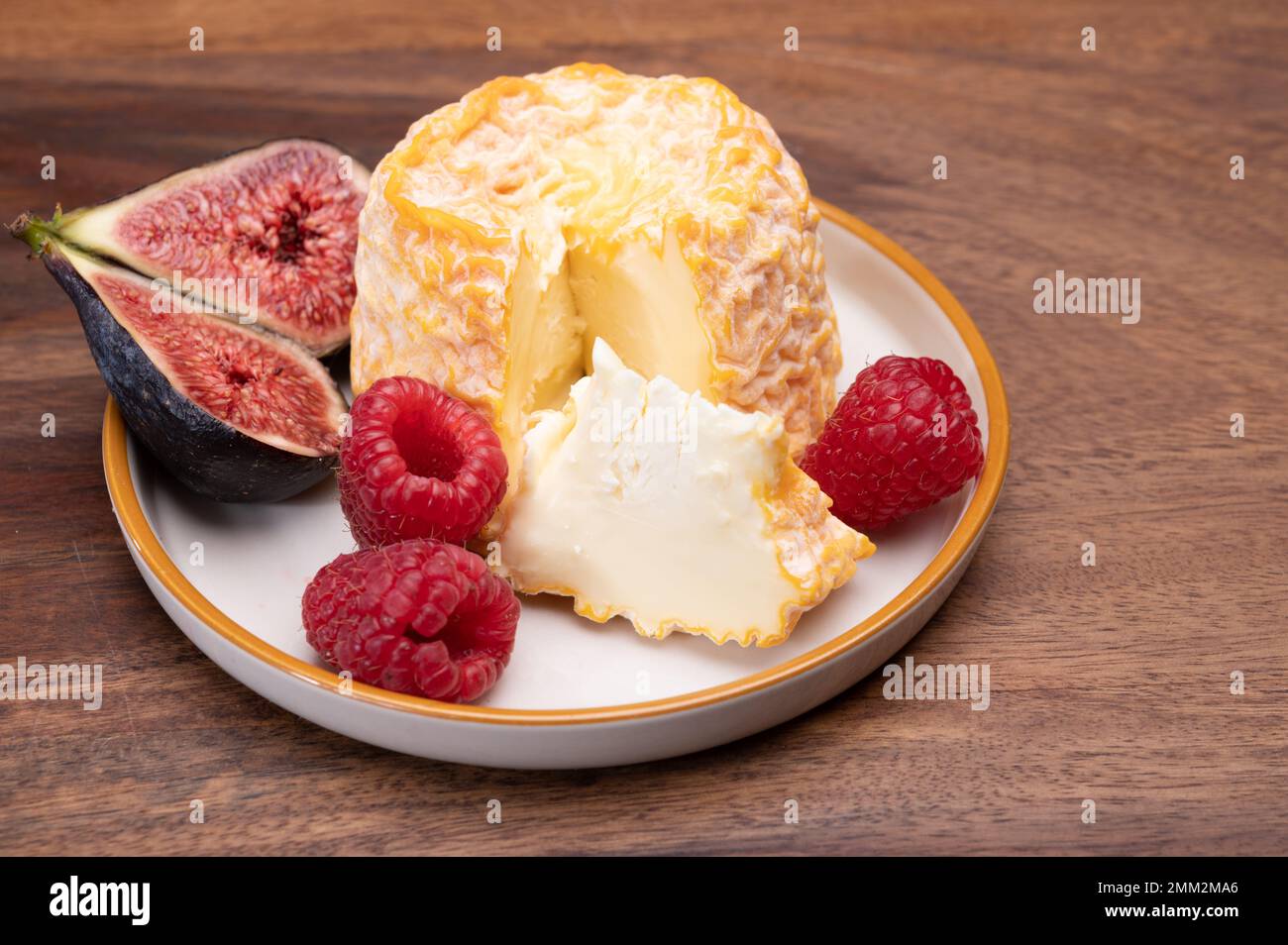 French Langres soft cows crumbly cheese with washed rind structure made ...