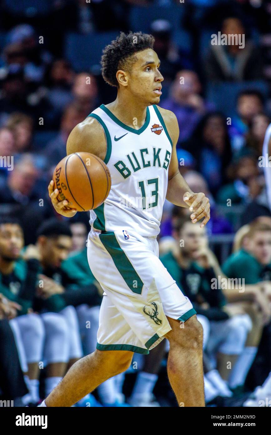 Milwaukee Bucks guard Malcolm Brogdon (13) looks to pass against the ...