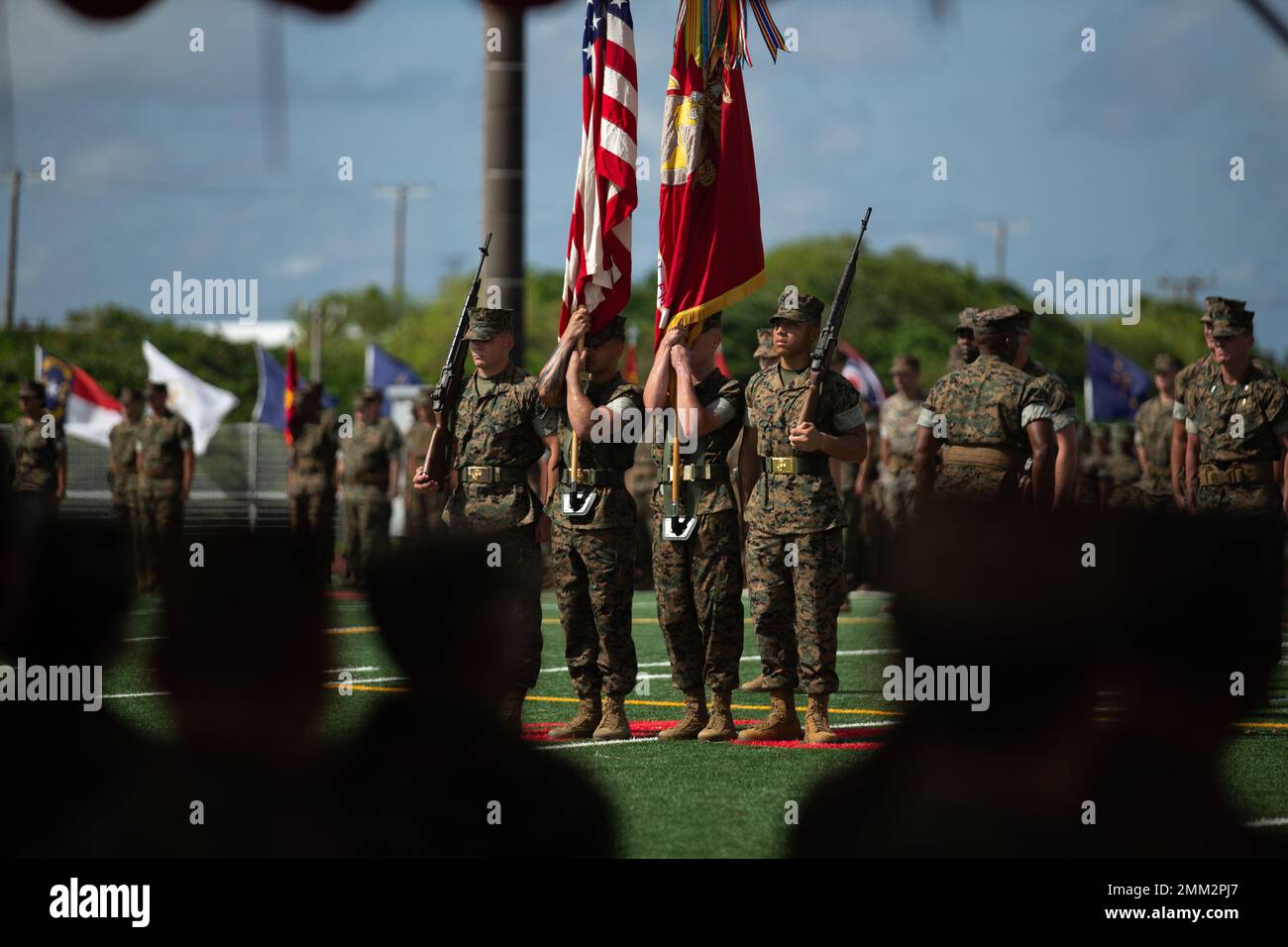 U.S. Marines with the 3d Marine Division color guard participate in a ...