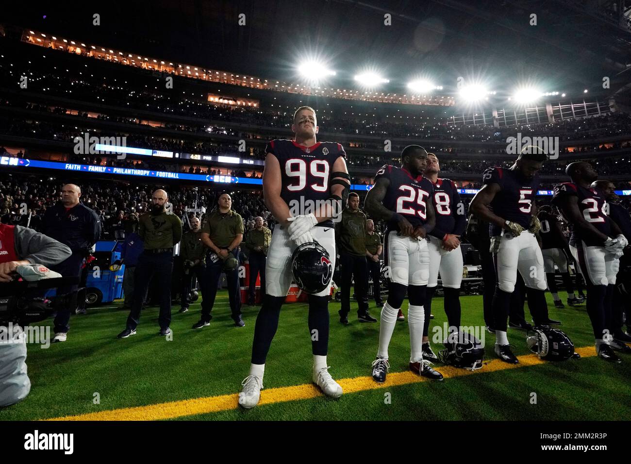 Houston Texans defensive end J.J. Watt (99) and teammates take part in ...