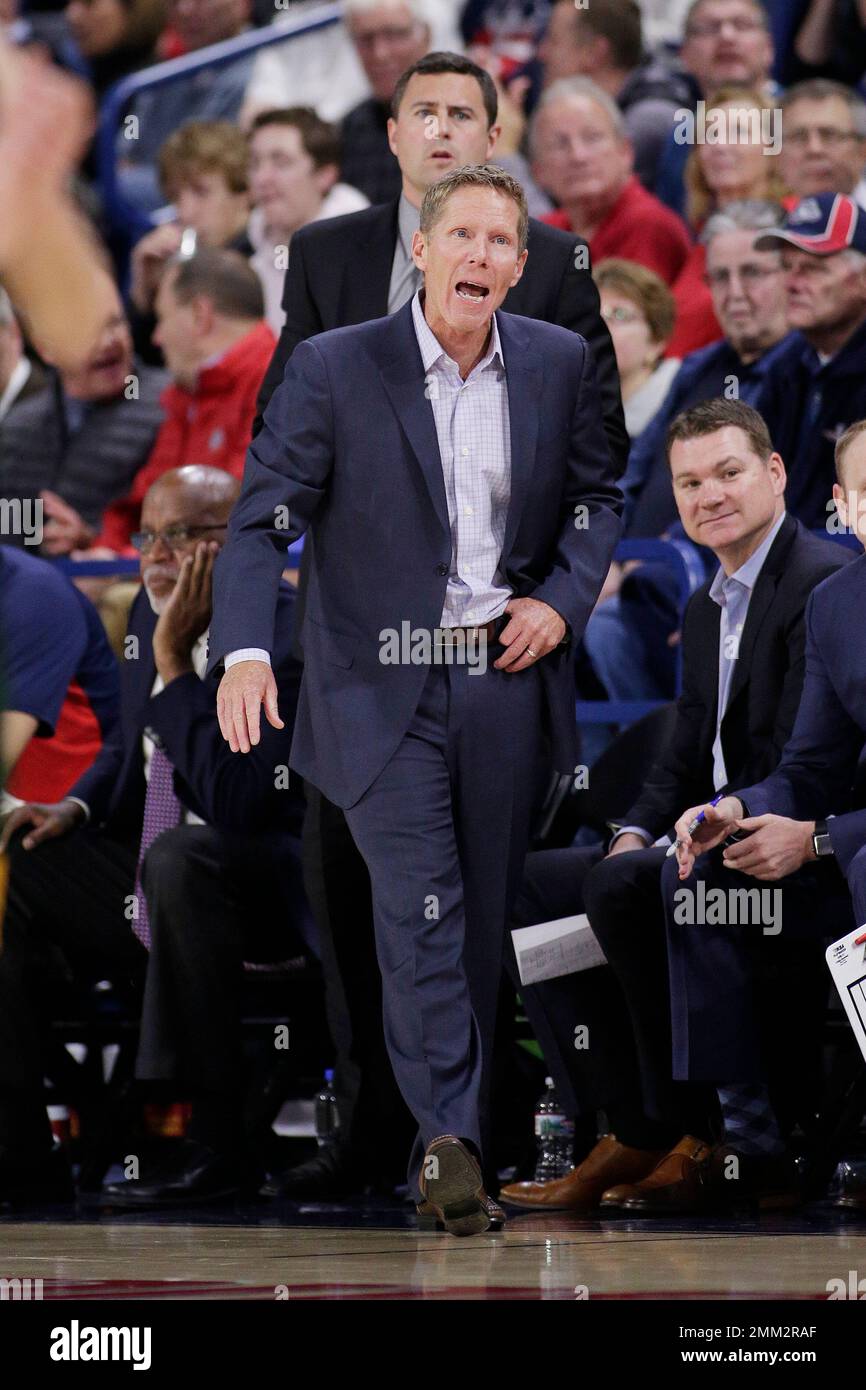 Gonzaga head coach Mark Few, center, shouts to his team during the ...