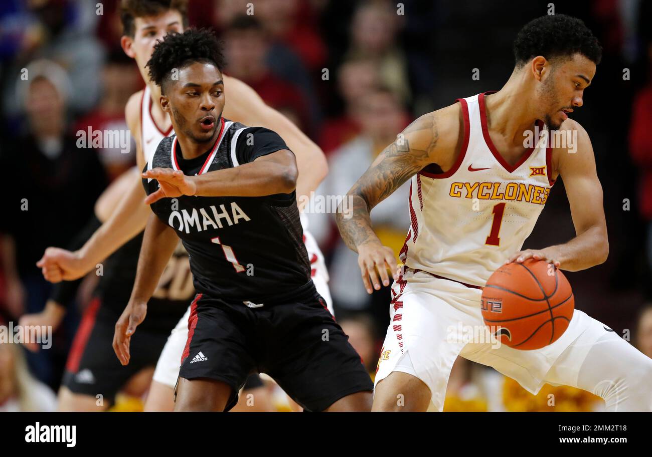 Iowa State guard Nick Weiler-Babb, right, drives around Nebraska-Omaha ...