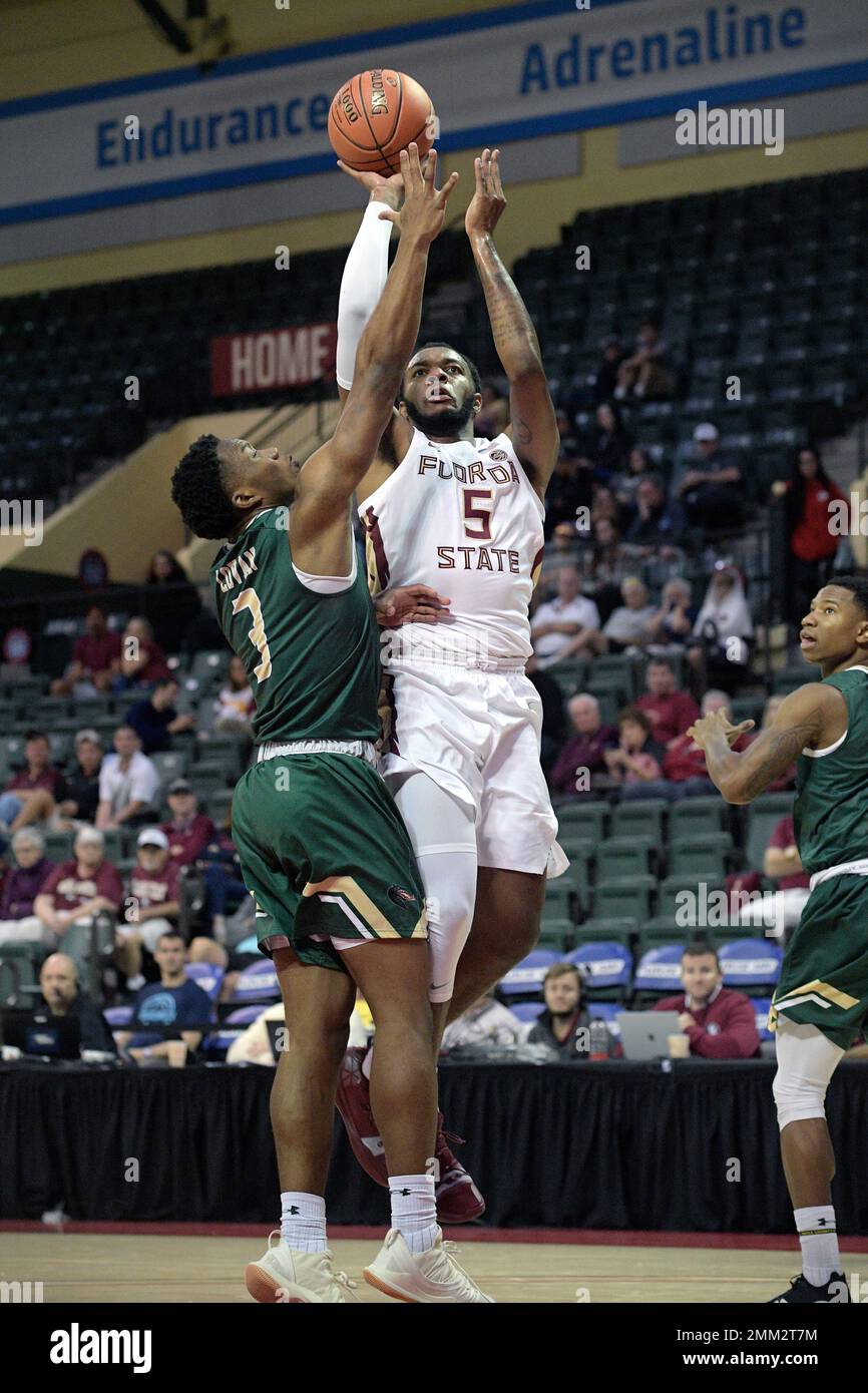 Florida State guard PJ Savoy (5) goes up for a shot in front of UAB ...