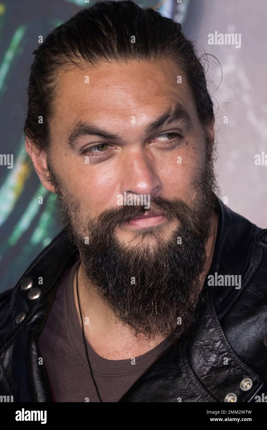 Actor Jason Momoa poses for photographers upon arrival at the world ...