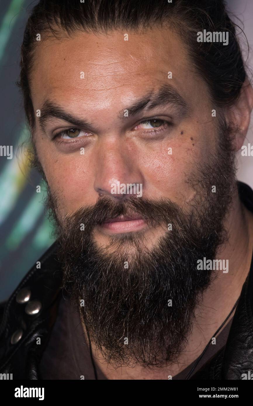 Actor Jason Momoa poses for photographers upon arrival at the world ...