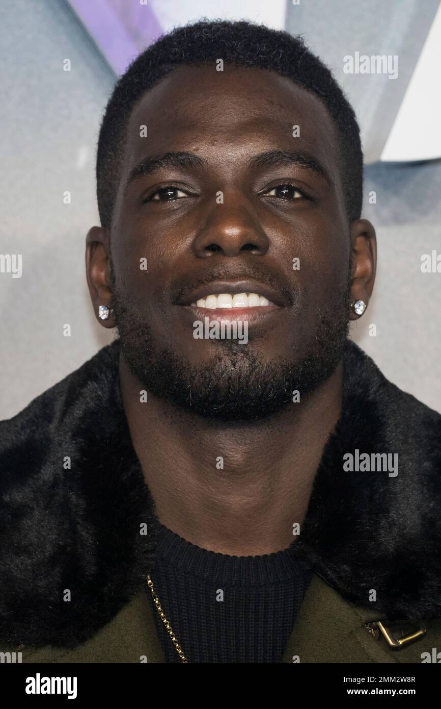 Marcel Somerville poses for photographers upon arrival at the world ...