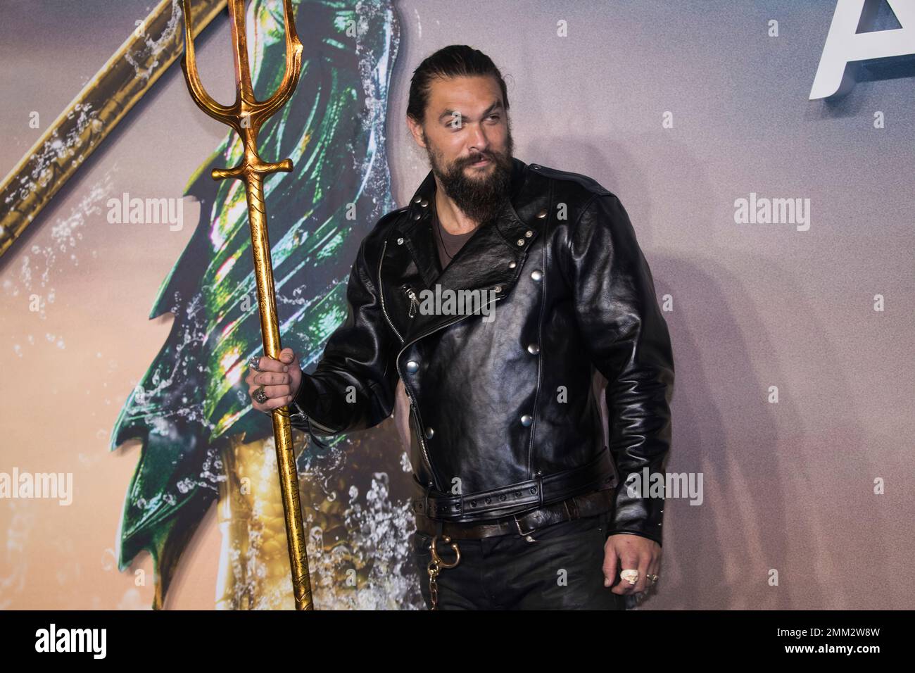 Actor Jason Momoa poses for photographers upon arrival at the world ...