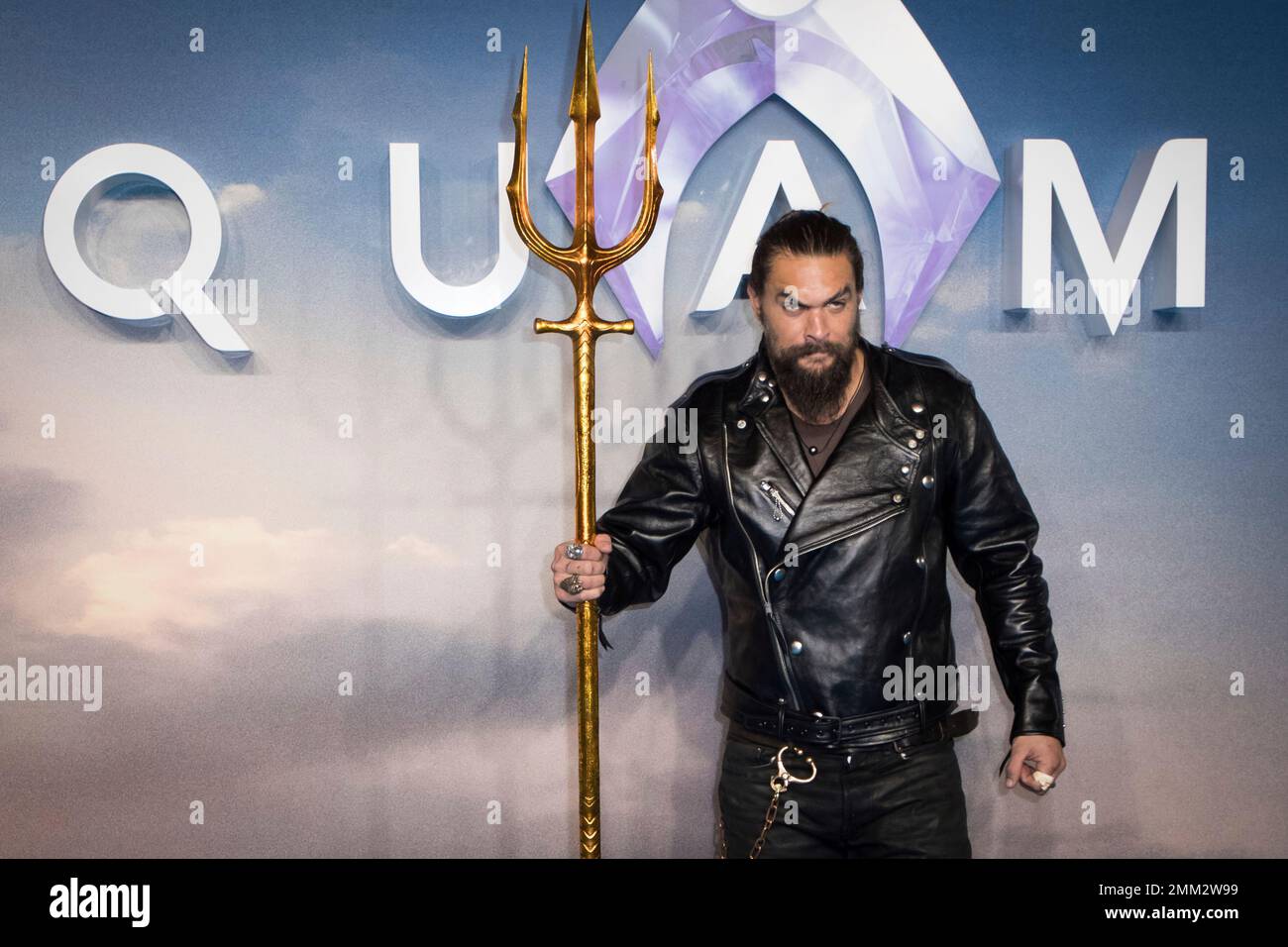 Actor Jason Momoa poses for photographers upon arrival at the world ...