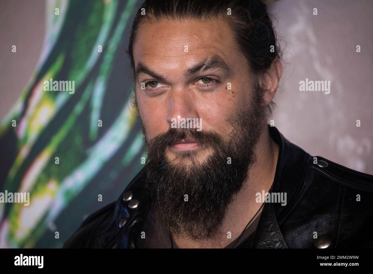 Actor Jason Momoa poses for photographers upon arrival at the world ...
