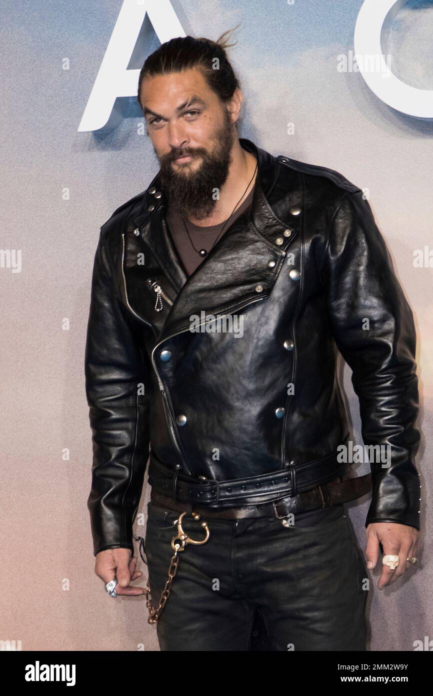 Actor Jason Momoa poses for photographers upon arrival at the world ...