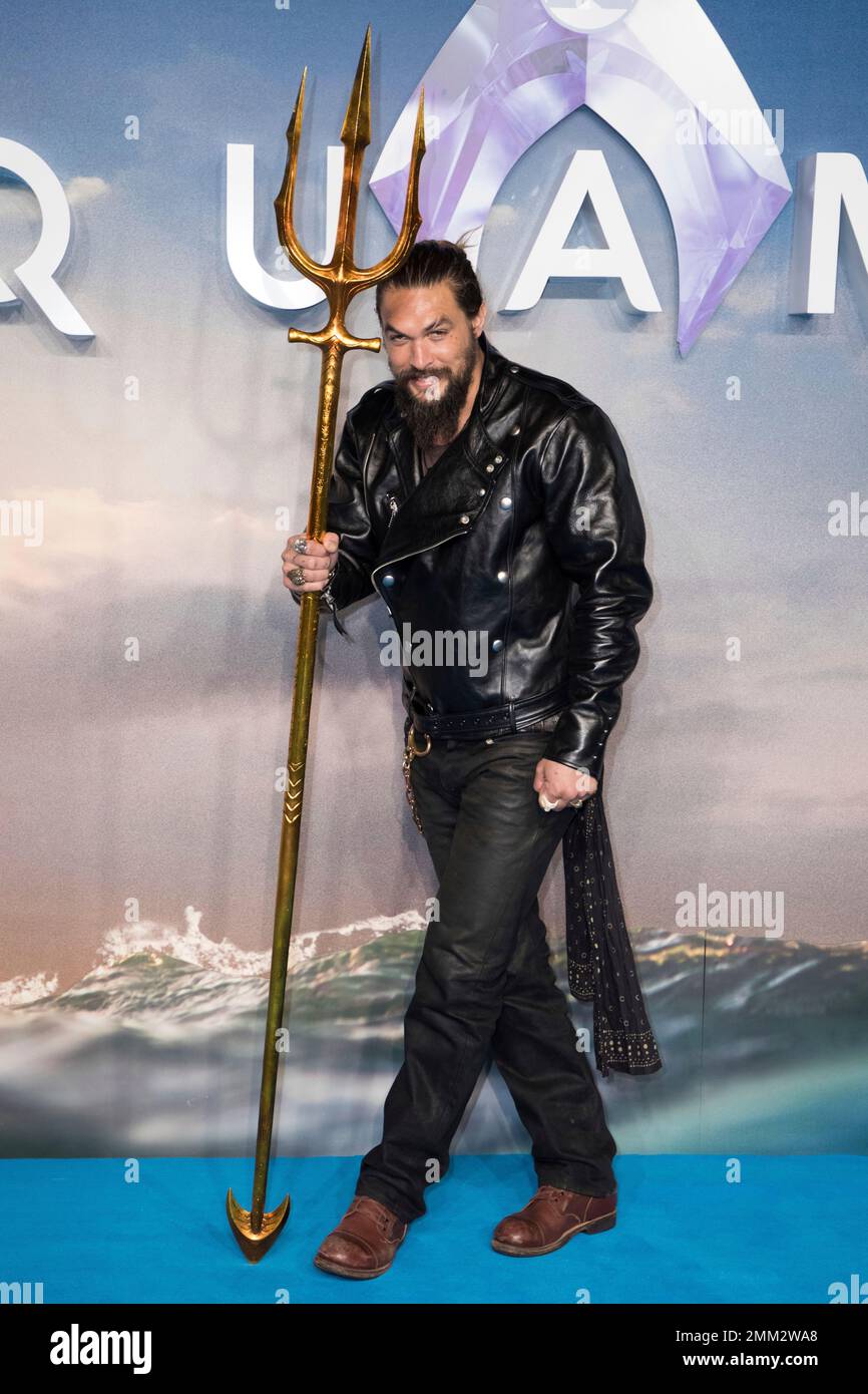 Actor Jason Momoa poses for photographers upon arrival at the world ...