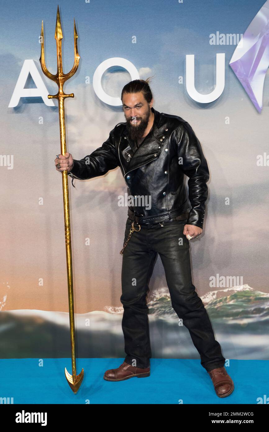 Actor Jason Momoa poses for photographers upon arrival at the world ...