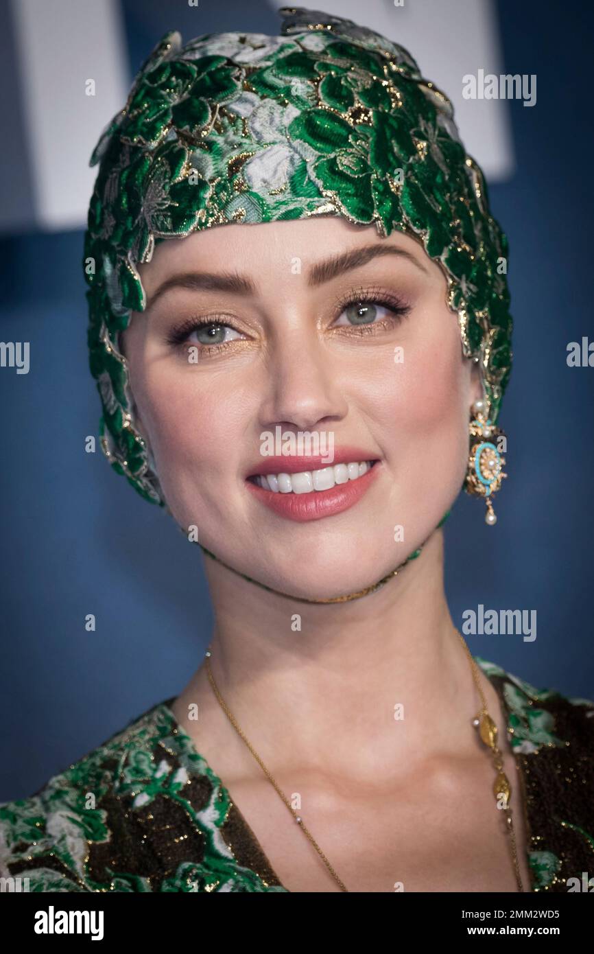 Actress Amber Heard poses for photographers upon arrival at the world ...