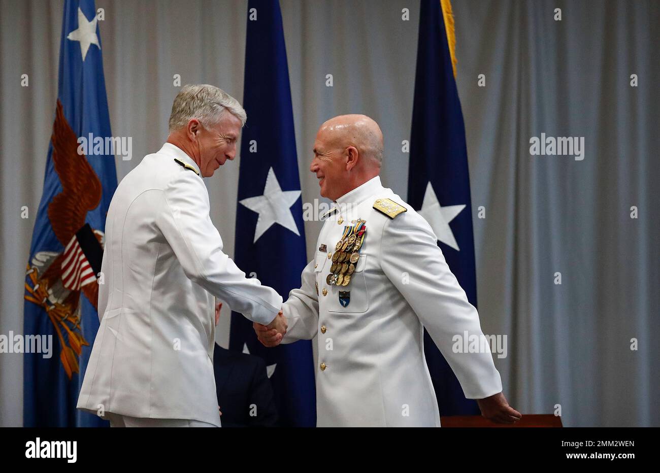 U.S. Navy Adm. Craig Faller, left, and U.S. Navy Adm. Kurt Tidd, right ...