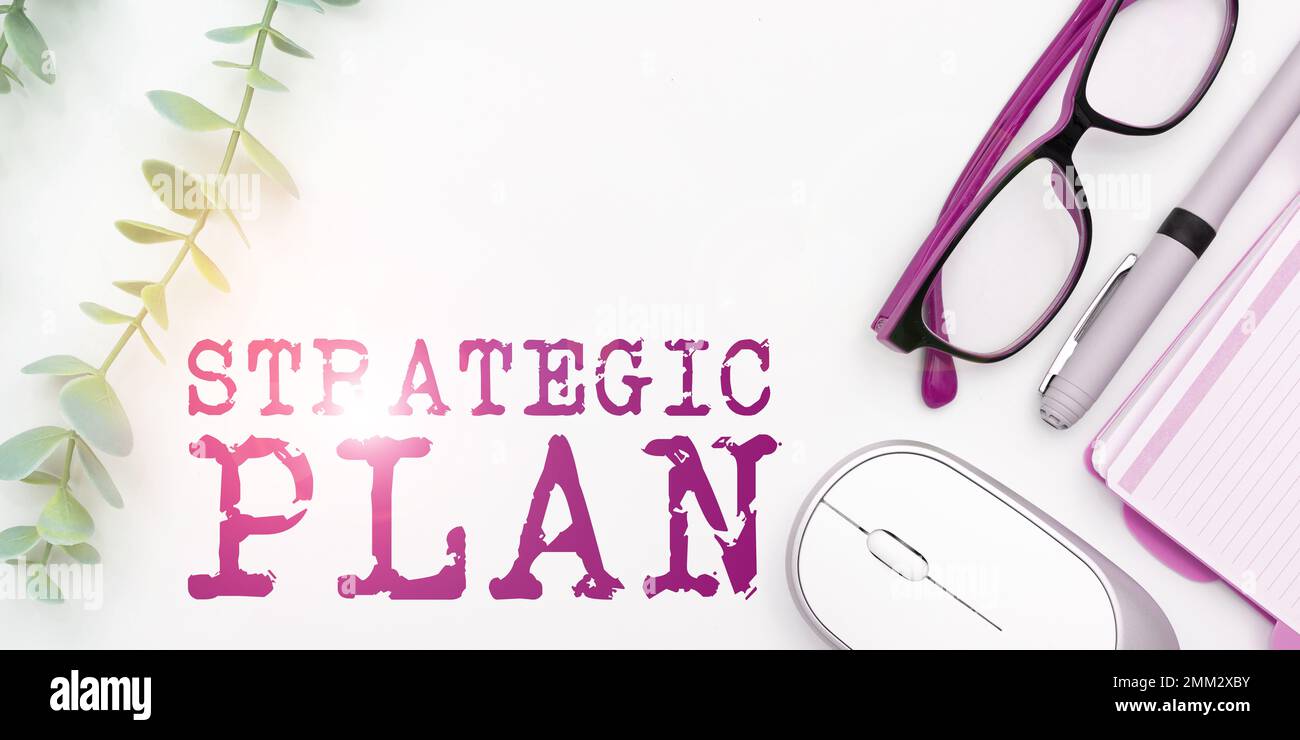 Sign displaying Strategic Plan. Business overview A process of defining ...