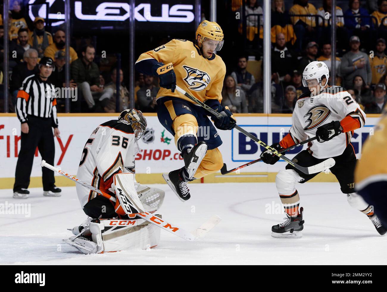 Nashville Predators center Nick Bonino (13) jumps out of the way of a ...
