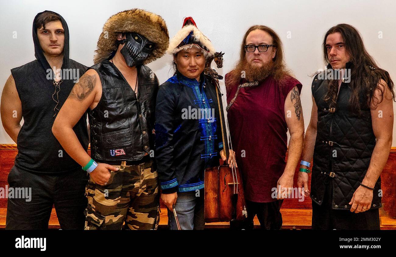 The New York City based folk metal band Tengger Cavalry pose offstage ...