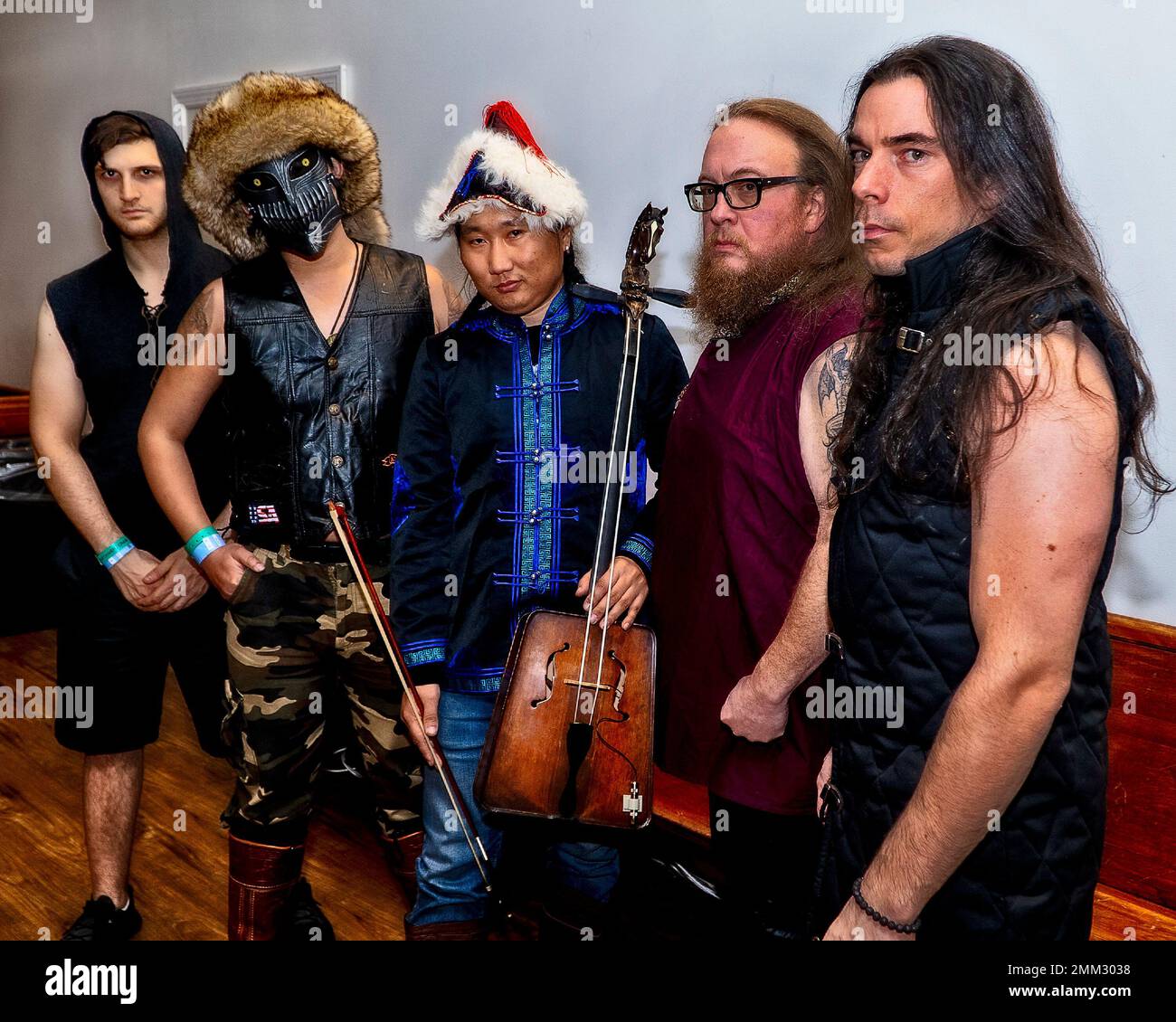 The New York City based folk metal band Tengger Cavalry pose offstage ...