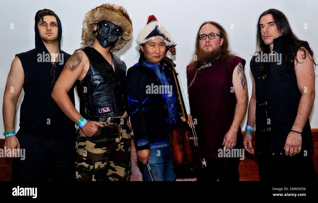 The New York City based folk metal band Tengger Cavalry pose offstage ...