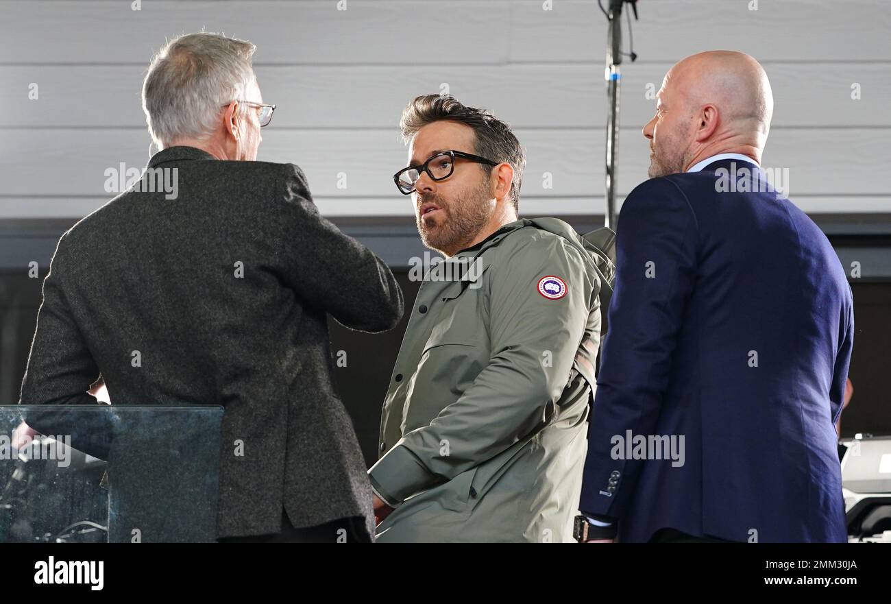Wrexham co-owner Ryan Reynolds (centre) speaks to BBC Sport's Gary Lineker (left) and Alan ...