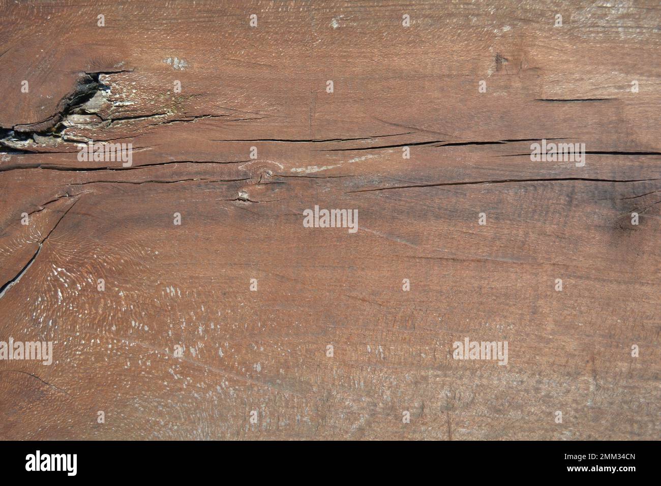 Abstract background of brown red wooden half log surface painted with ...