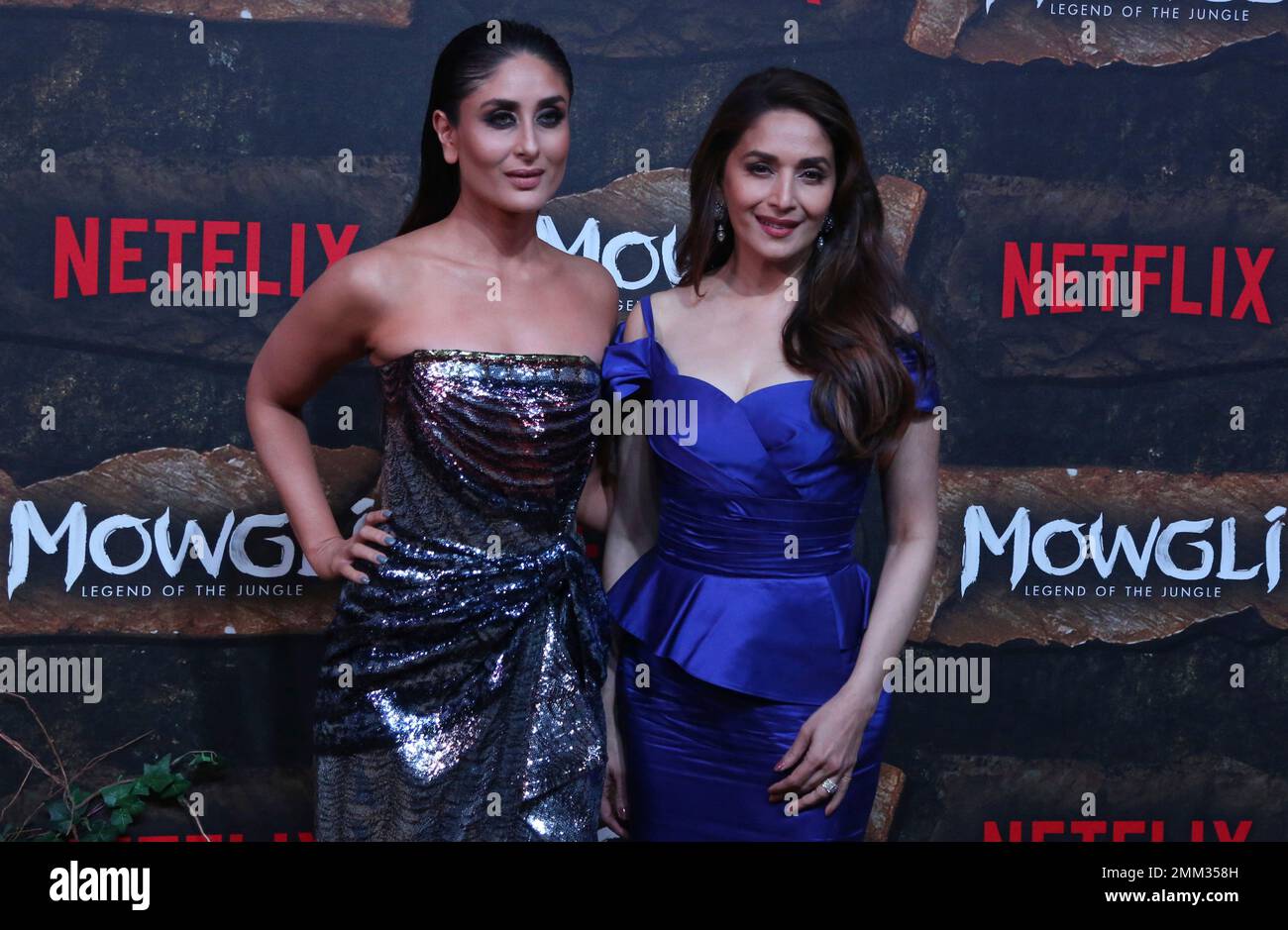 Bollywood actors Kareena Kapoor, left, and Madhuri Dixit pose during a ...