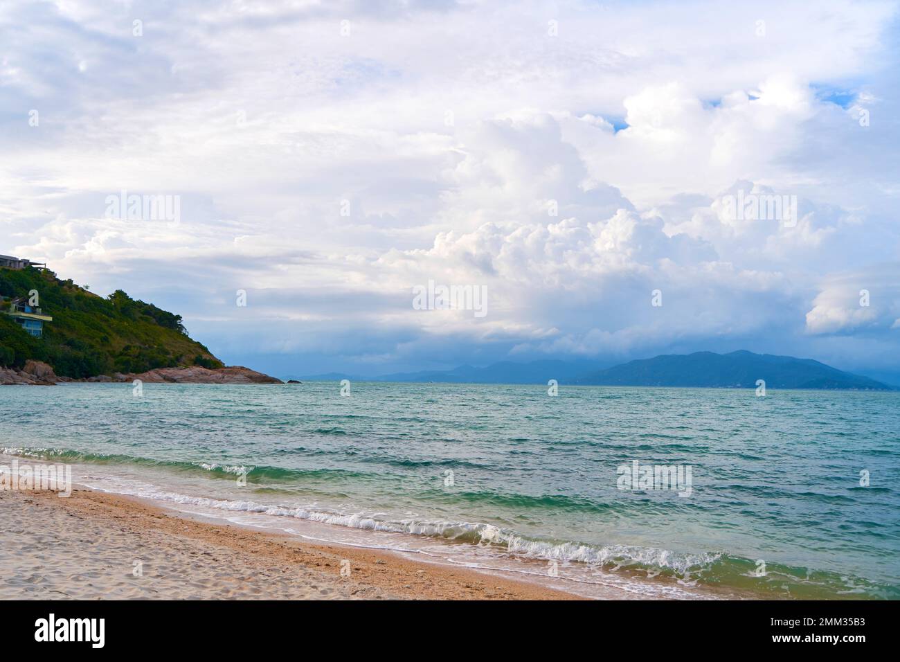 Rain clouds over an island in the sea. The rain is coming Stock Photo ...
