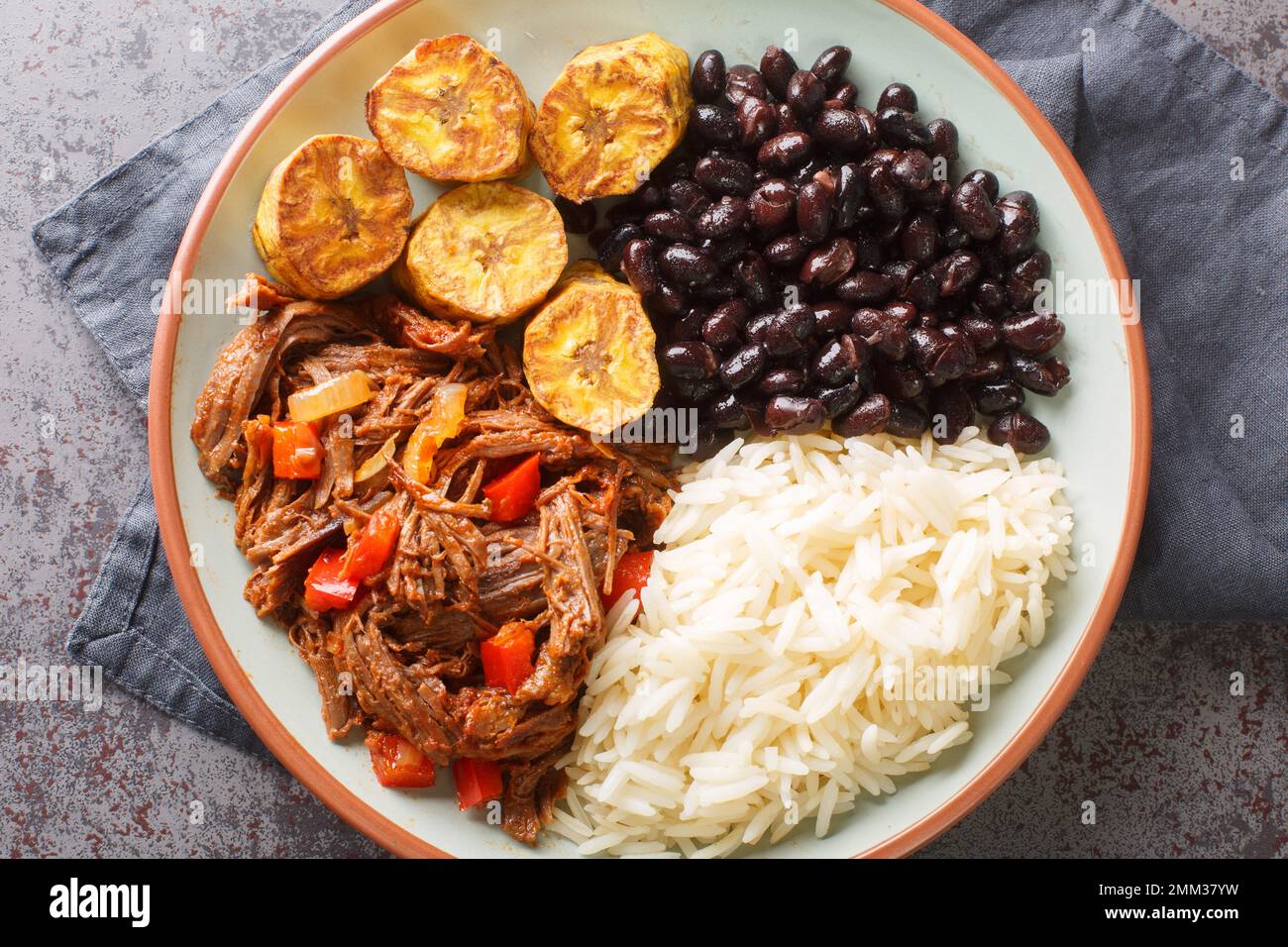 Tasty Pabellon criollo is a Venezuelan dish made with shredded beef ...