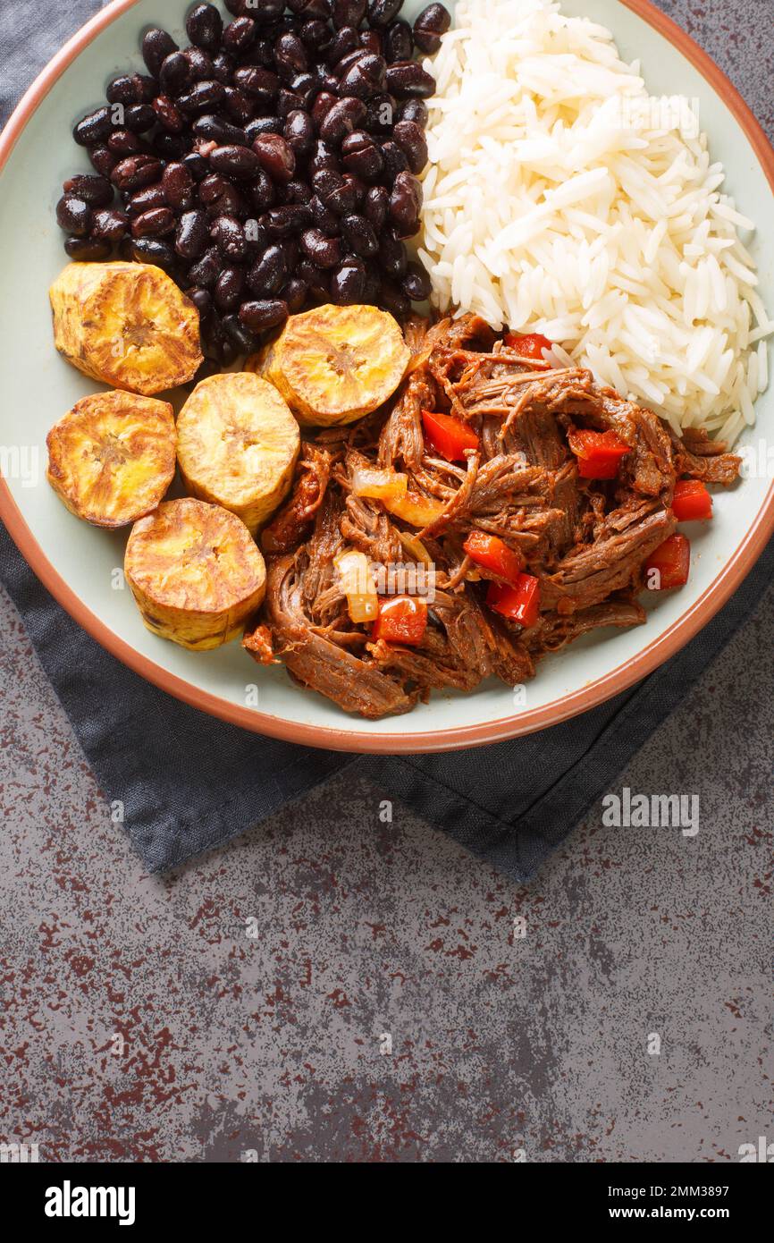 Traditional Venezuelan dish Pabellon Criollo with White Rice, Black ...