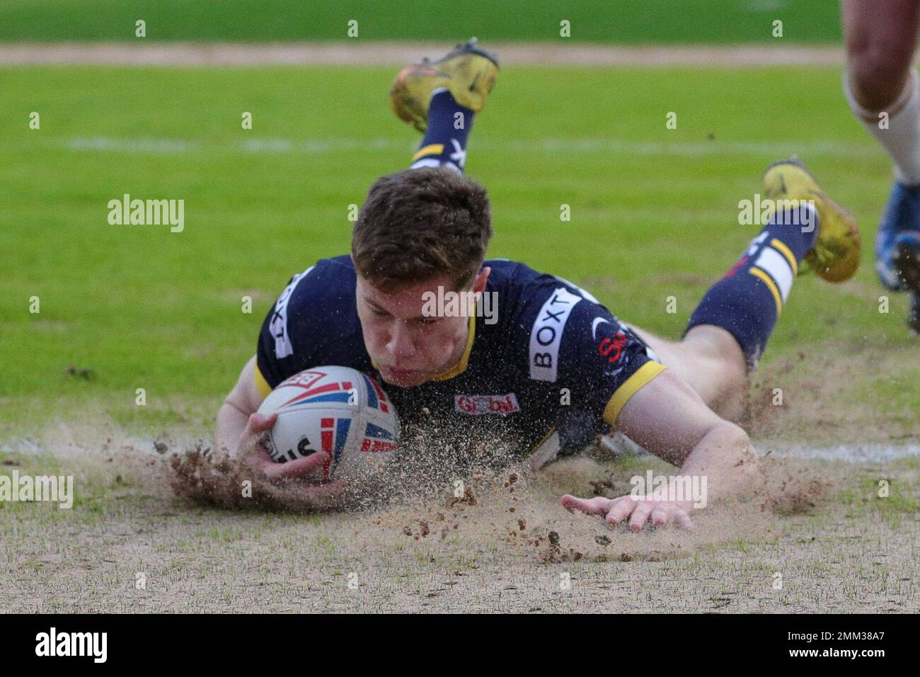 Morgan Gannon #20 of Leeds Rhinos goes over for a try and makes the ...