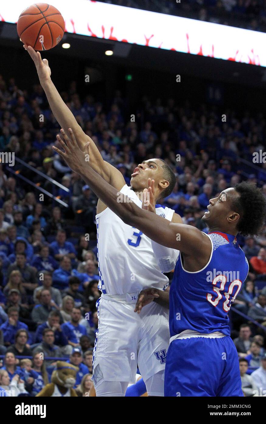 Kentucky's Keldon Johnson (3) shoots while pressured by Tennessee State ...