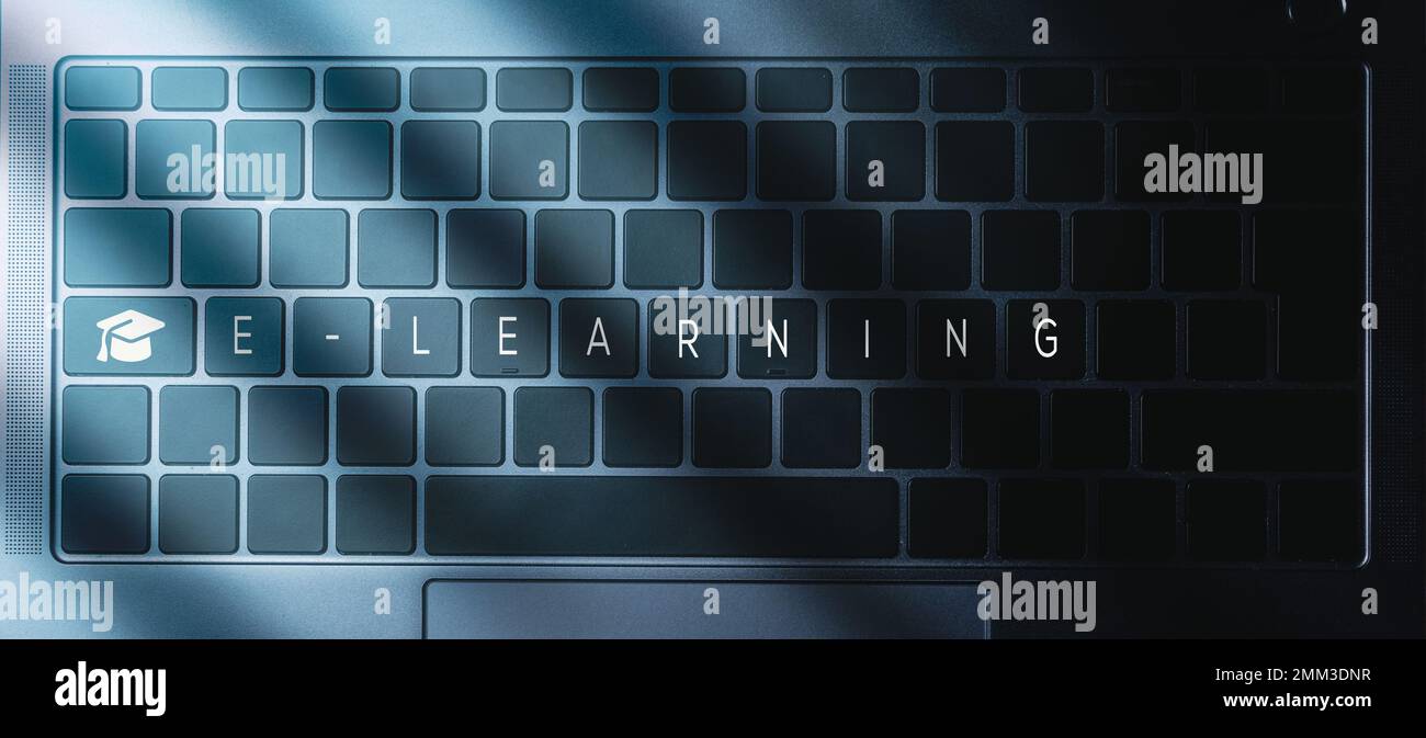 Laptop keyboard with blue light and E-learning text on buttons and ...