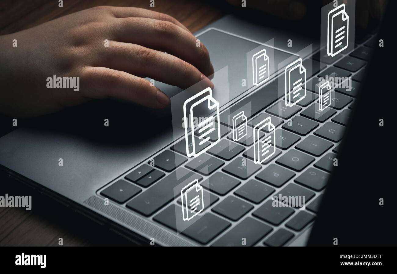 Woman using laptop with VR interface of documents. Document Management ...