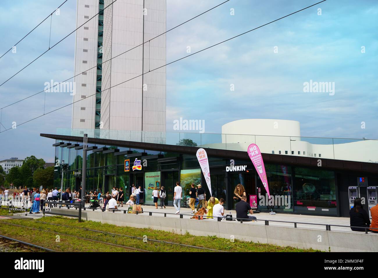 Walkable green roof with stores and a restaurant underneath, at Kö ...