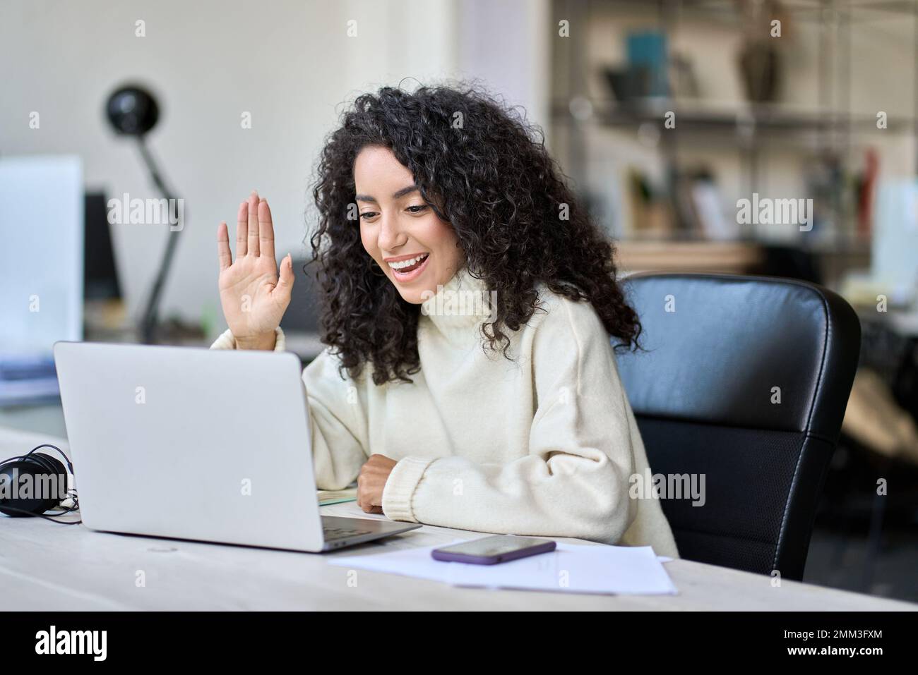 Female executive having video call hi-res stock photography and images ...