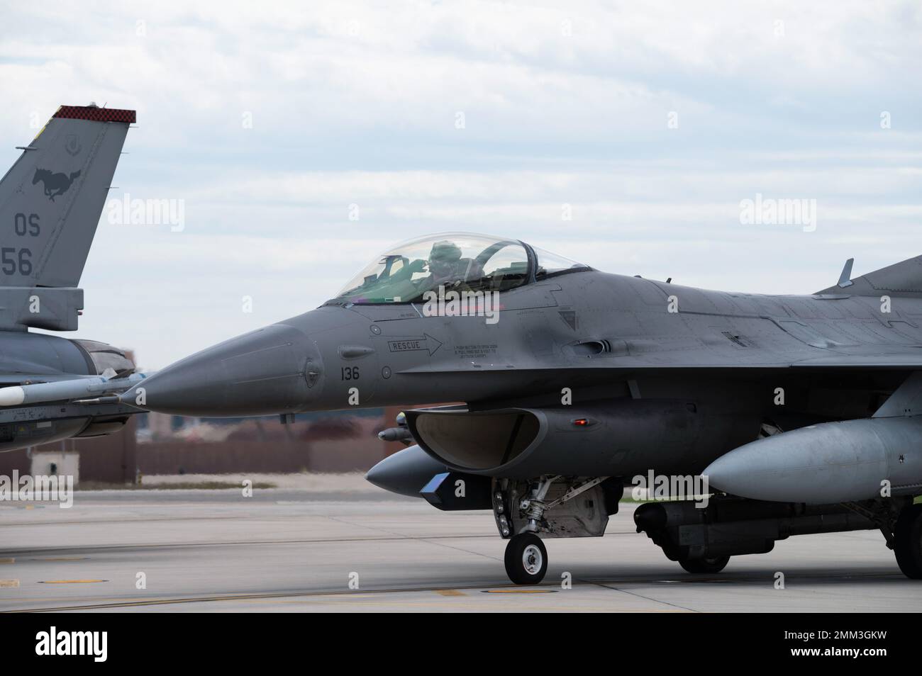 An F-16 Fighting Falcon assigned to the 36th Fighter Squadron waits to ...