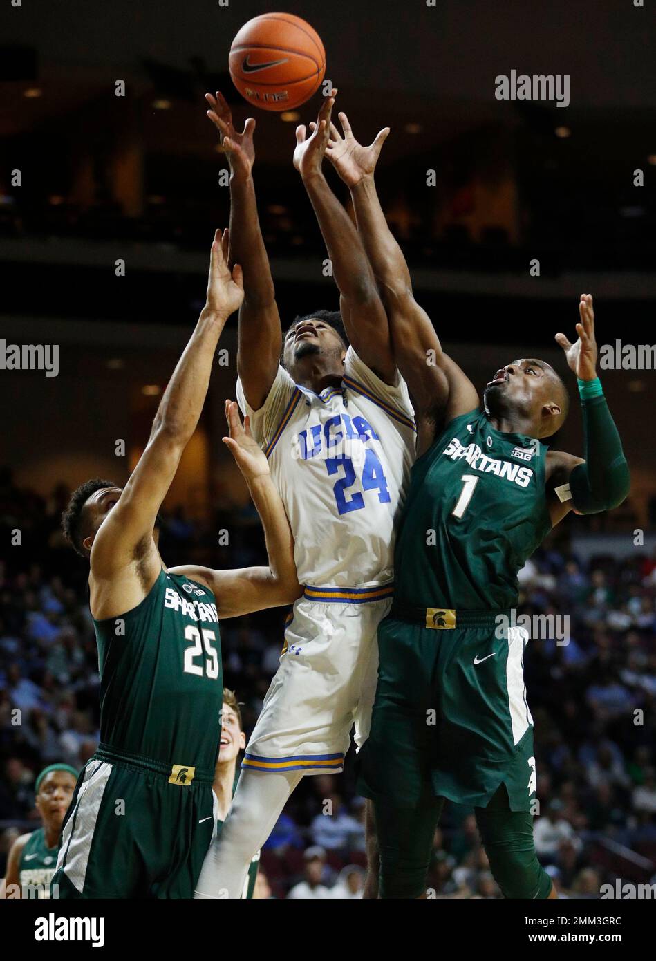 Michigan State's Kenny Goins (25), UCLA's Jalen Hill (24) and and ...