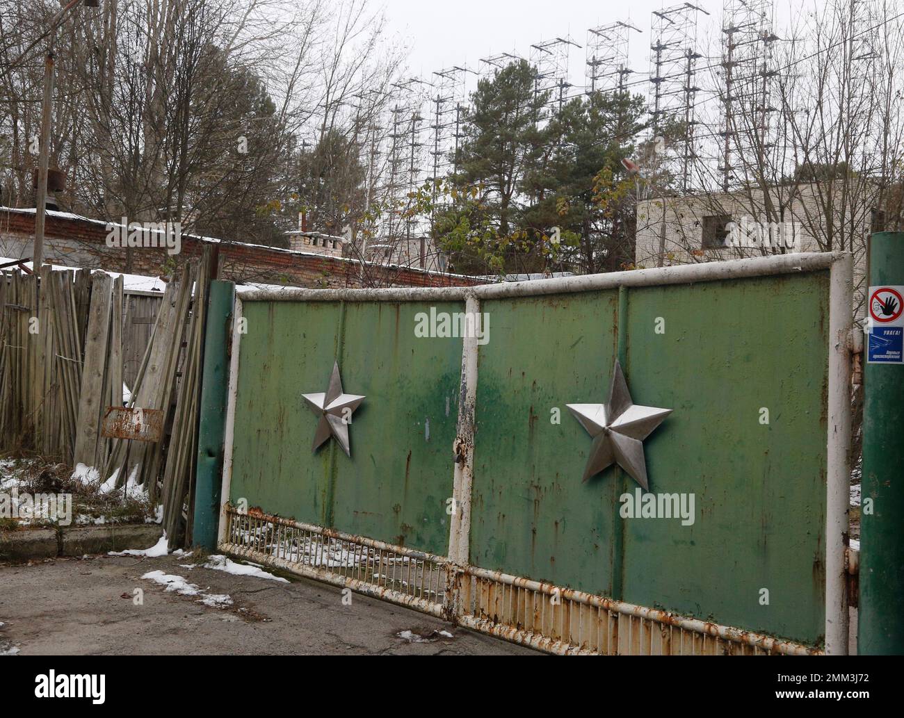 Metal stars decorate the gate of a Soviet-era military base near a ...