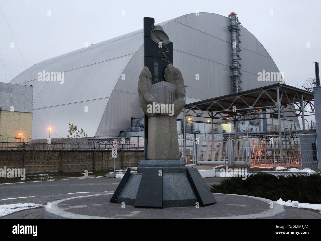 The monument dedicated to the victims of the Chernobyl tragedy stands ...