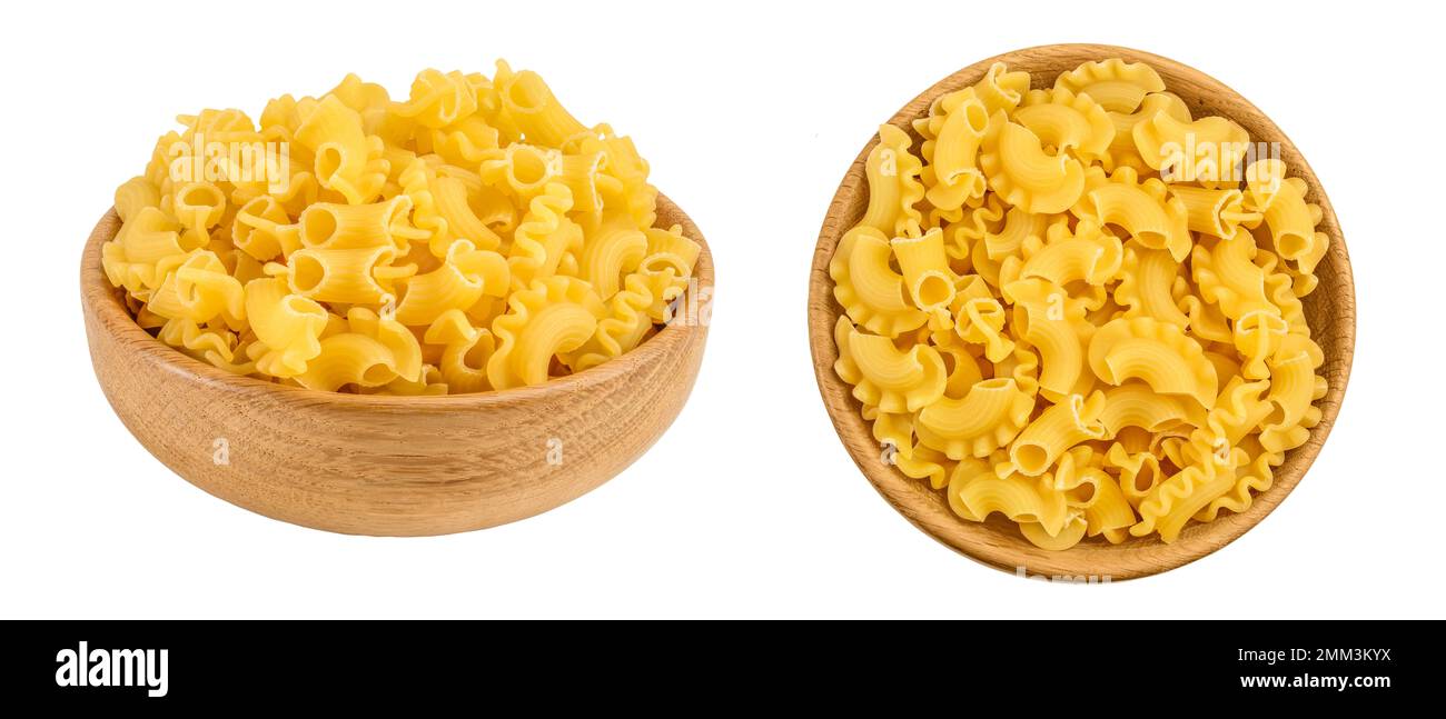 Pasta cornetti creste macaroni in wooden bowl isolated on white ...