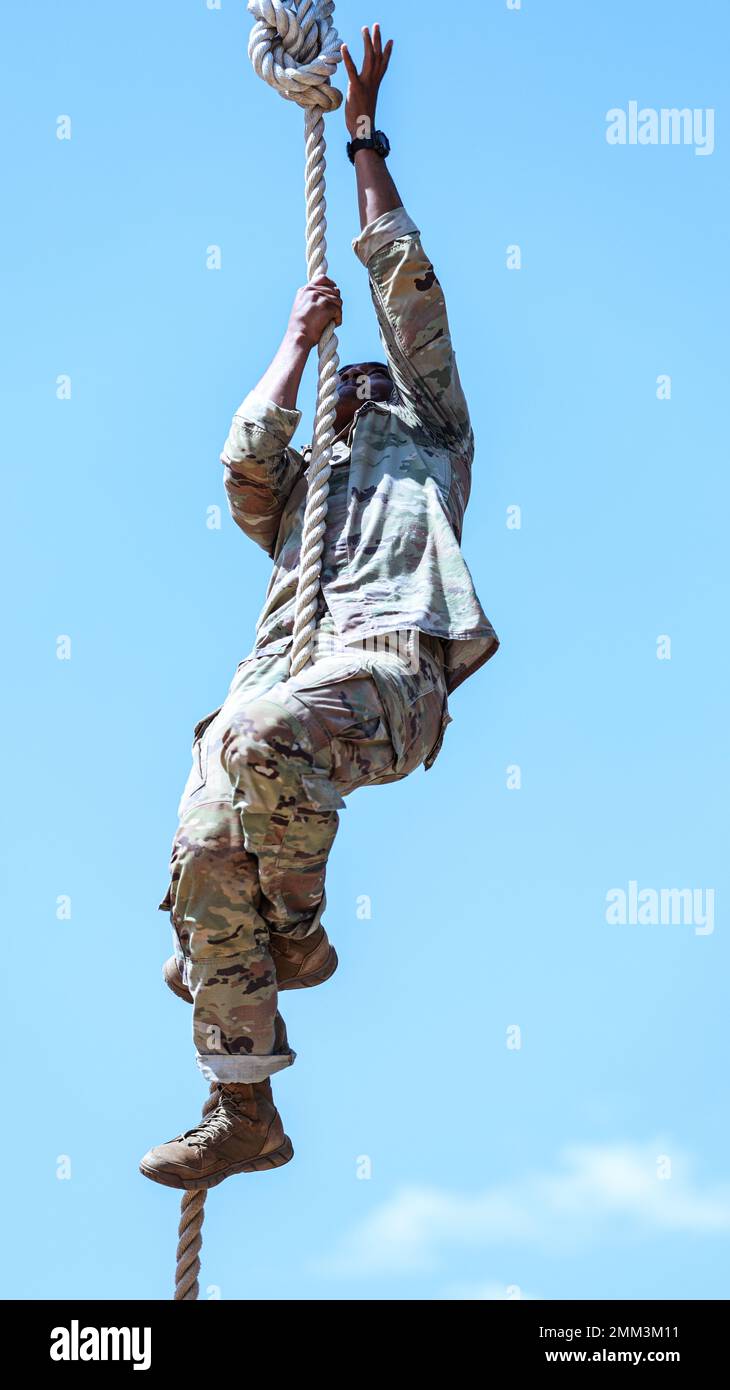 A Soldier complete a rope climb during day 3 of the U.S. Army Training ...