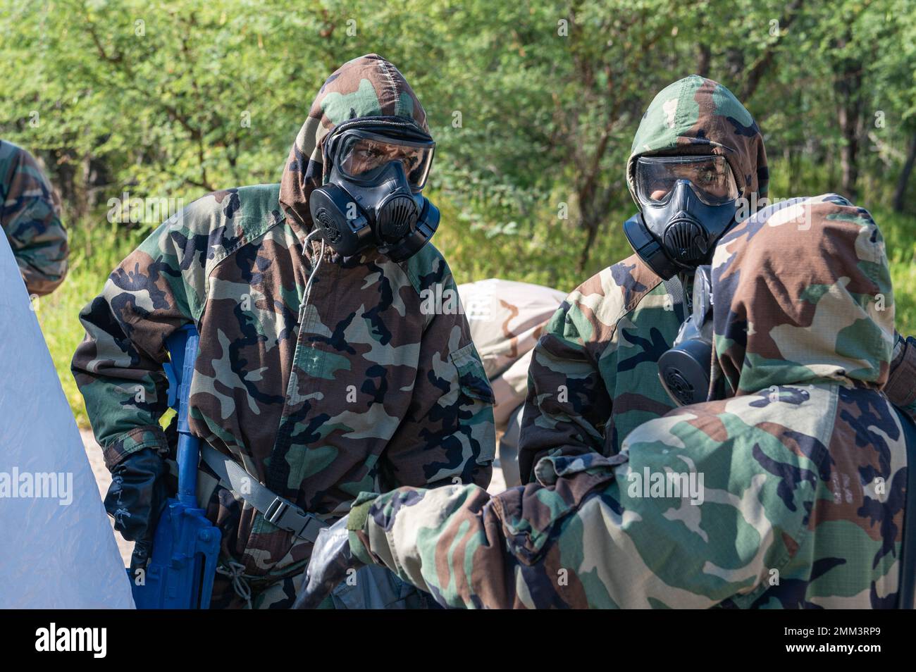 Airmen assess for possible contamination of an asset, during a chemical ...