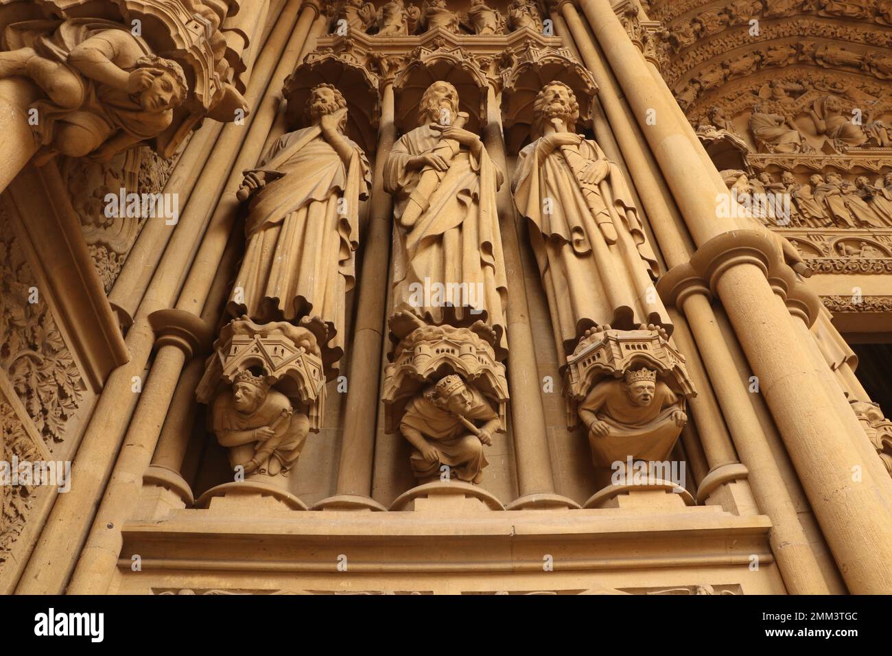 statues of three apostles on exterior of cathedral in Metz, France ...