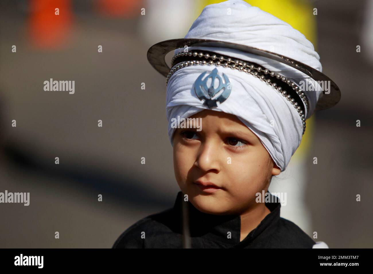 A young Sikh boy participates in a procession ahead of the birth ...