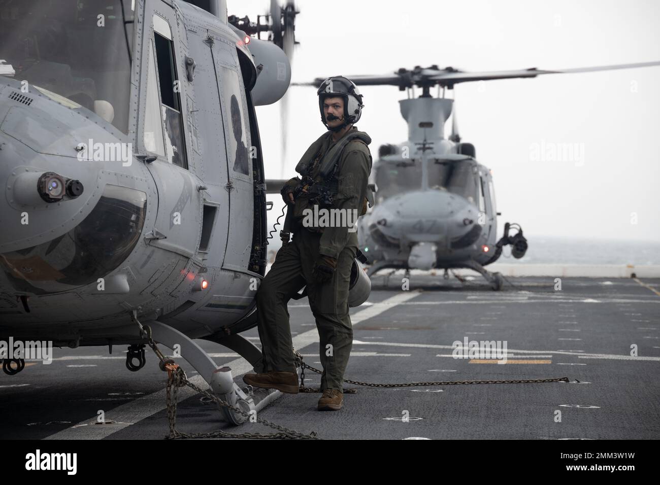A U.S. Marine with Marine Light Attack Helicopter Squadron (HMLA) 773 ...